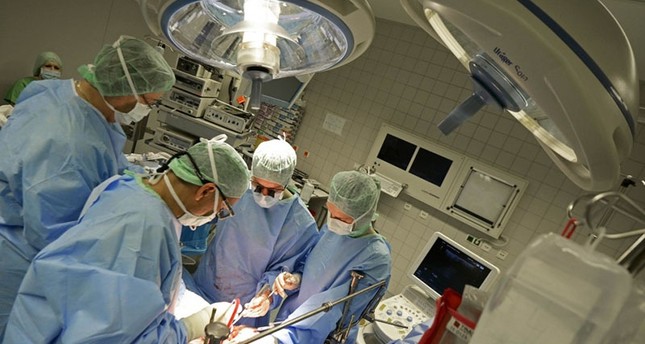 British surgeon who carved initials on patients' livers sentenced ...