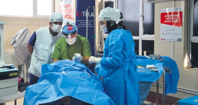 Volunteer doctors help Afghans, Palestinians needing surgeries - Daily ...